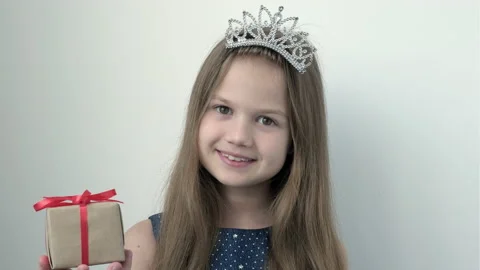 Smiling little girl wearing princess cro... | Stock Video | Pond5