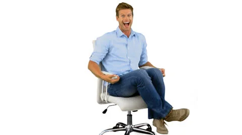 Smiling man turning on swivel chair on w... | Stock Video | Pond5