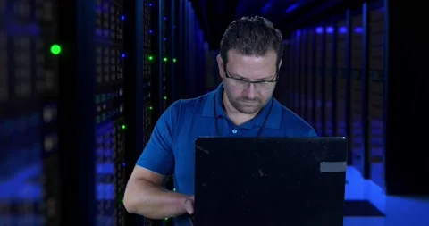 Smiling People Working In A Data Center ... | Stock Video | Pond5
