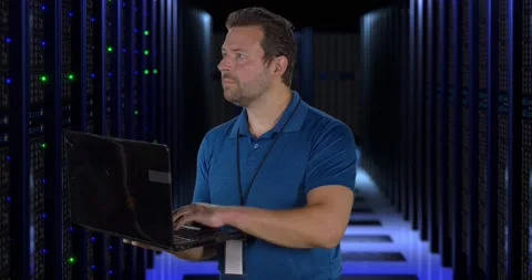 Smiling People Working In A Data Center ... | Stock Video | Pond5