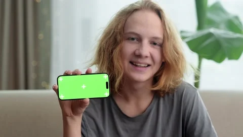 smiling teen boy ginger long hair showin... | Stock Video | Pond5