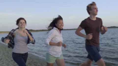 Smiling Teens Run, Toward Camera, Down S... | Stock Video | Pond5