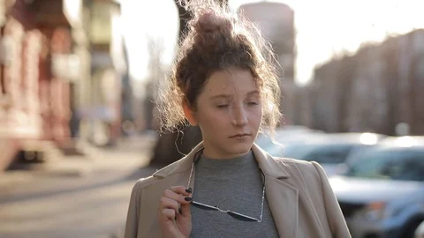 Smiling unconventional woman try on sung... | Stock Video | Pond5