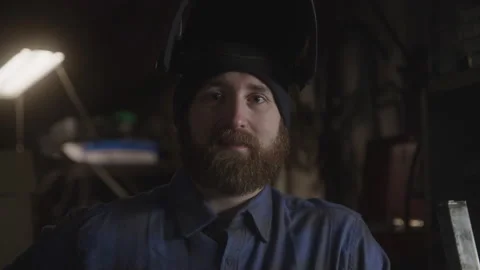 Smiling Welder Headshot with a Welding H... | Stock Video | Pond5
