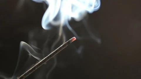 smoke from an burning aromatic stick on ... | Stock Video | Pond5