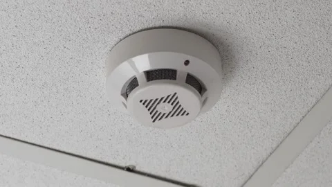 Smoke detector mounted on a suspended ce... | Stock Video | Pond5