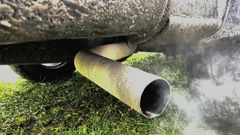 Smoke emissions from Car exhaust pipe, c... | Stock Video | Pond5