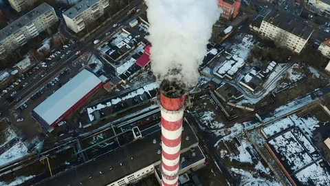 Smoke flowing out of the city from a lar... | Stock Video | Pond5