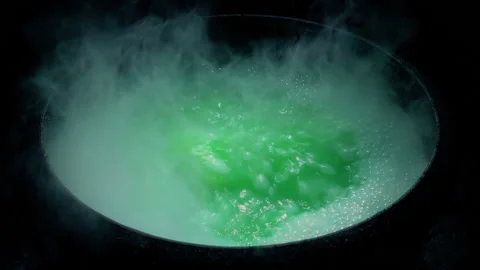 Smoke Rises From Spooky Green Boiling Ca... | Stock Video | Pond5