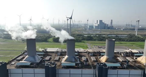 Smoking smoke stacks, showcasing fossil ... | Stock Video | Pond5