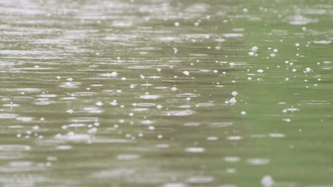 Smooth surface of a reservoir during rai... | Stock Video | Pond5