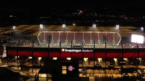 Snapdragon Stadium at night with flood l... | Stock Video | Pond5