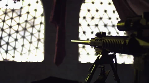 Sniper rifle aiming at window in worn to... | Stock Video | Pond5