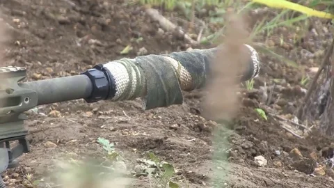 Sniper shoots, barrel of a sniper rifle | Stock Video | Pond5