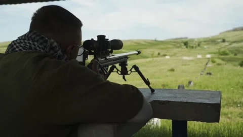 Sniper training at the shooting range. A... | Stock Video | Pond5