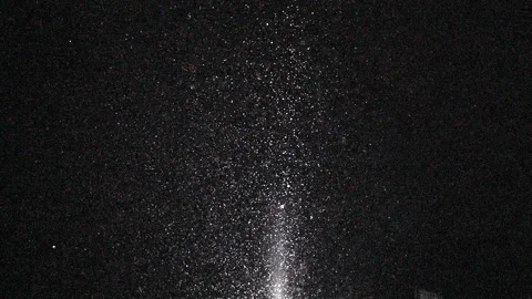 Snow flakes falling deep dark night with... | Stock Video | Pond5