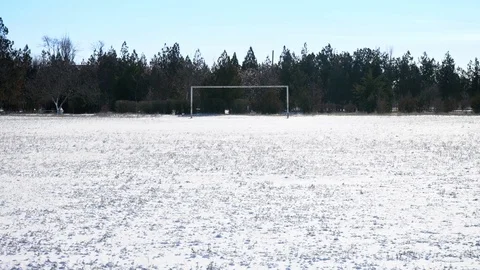 Snow on the football field. Old football... | Stock Video | Pond5