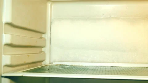 Snow in the fridge. The broken refrigera... | Stock Video | Pond5