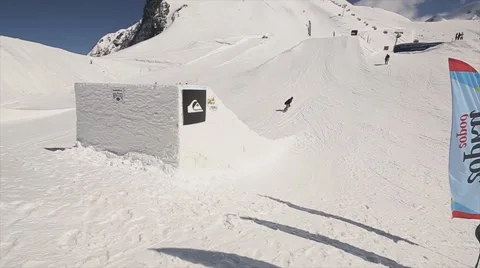 Snowboarder high jump from springboard. ... | Stock Video | Pond5
