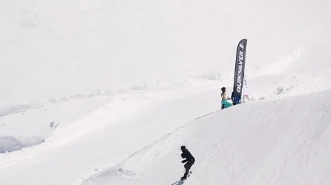 Snowboarder high jump from springboard, ... | Stock Video | Pond5