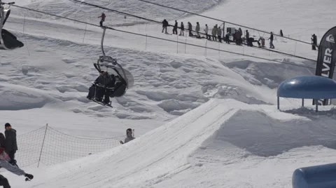 Snowboarder jump over springboard, make ... | Stock Video | Pond5