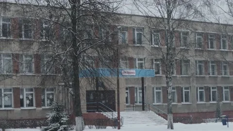 Snowfall on the background of the school... | Stock Video | Pond5