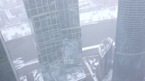 Snowfall in Moscow City. High-rise mirro... | Stock Video | Pond5