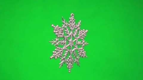 Snowflake on green screen | Stock Video | Pond5
