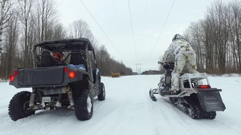 snowmobile and utv drag race rear angle ... | Stock Video | Pond5