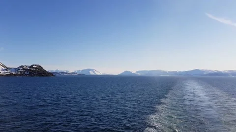 snowy mountain islands on a blue spring ... | Stock Video | Pond5