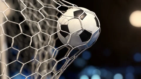 Soccer ball flies into the net on a stad... | Stock Video | Pond5