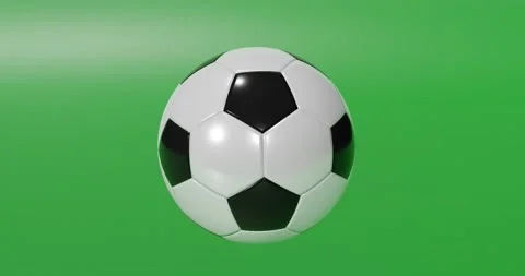 The soccer ball is spinning on a green b... | Stock Video | Pond5