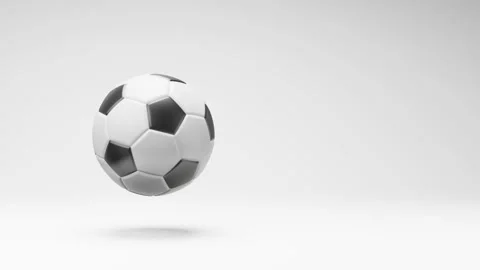 Soccer Ball Spinning on Studio Light Gra... | Stock Video | Pond5