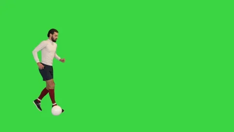 Soccer player running kicking a ball and... | Stock Video | Pond5