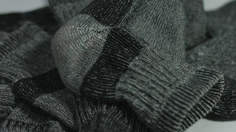 Socks Fall Into Frame Rotating White Bac... | Stock Video | Pond5