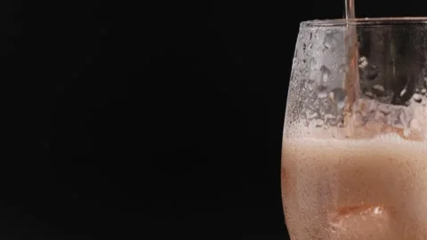 Soda fizzy cold drink in a glass with ic... | Stock Video | Pond5