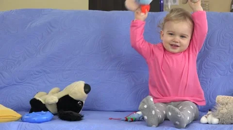 Soft toys rain falling on laughing cute ... | Stock Video | Pond5