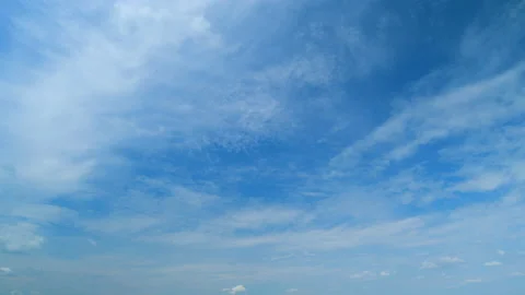 Soft white clouds moving on blue sky bac... | Stock Video | Pond5