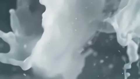 Soft White Liquid Flying With Dreamy Org... | Stock Video | Pond5