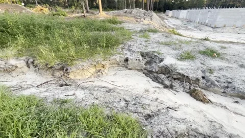 Soil erosion at home construction site. ... | Stock Video | Pond5
