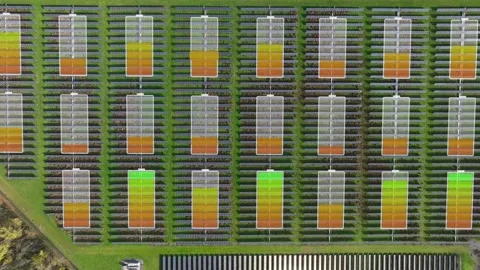 Solar farm array with battery charging s... | Stock Video | Pond5