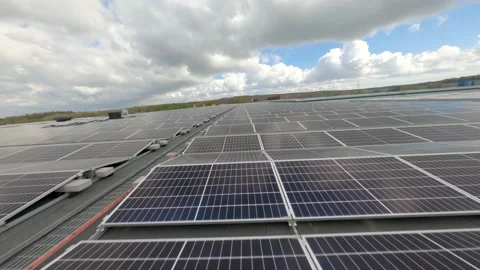 Solar panel park on a roof of an industr... | Stock Video | Pond5