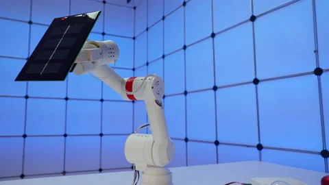 Solar panel in the robot arm. Robot ho... | Stock Video | Pond5