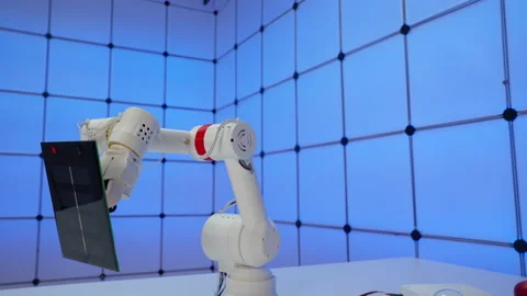 Solar panel in the robot arm. Robot ho... | Stock Video | Pond5