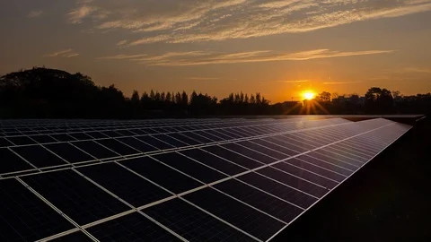 Solar panel with sunrise, time lapse | Stock Video | Pond5