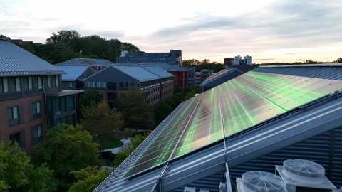 Solar panels on a building with green gl... | Stock Video | Pond5