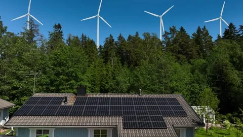 Solar panels on a house roof with forest... | Stock Video | Pond5