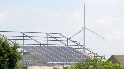 Solar panels on metal bars at roof of ho... | Stock Video | Pond5