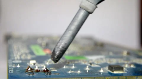 Soldering connector on the motherboard | Stock Video | Pond5