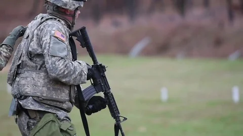 Soldier firing M4 carbine rifle at shoot... | Stock Video | Pond5